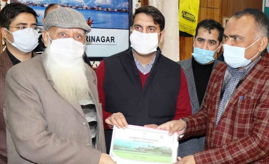 Div Com Kashmir, DC Srinagar hand over Land Passbooks to land owners ...